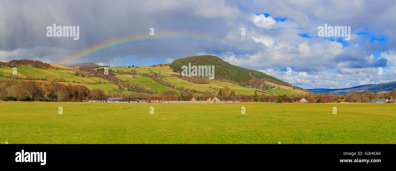 Beautiful rainbow with fields, houses at Highland, Scotland Stock Photo ...