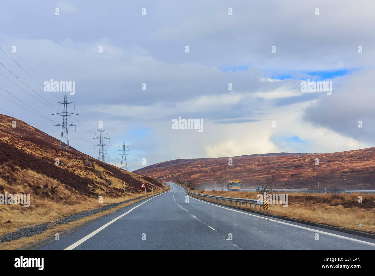 Beautiful country side view with road and tree at Highland, Scotland ...