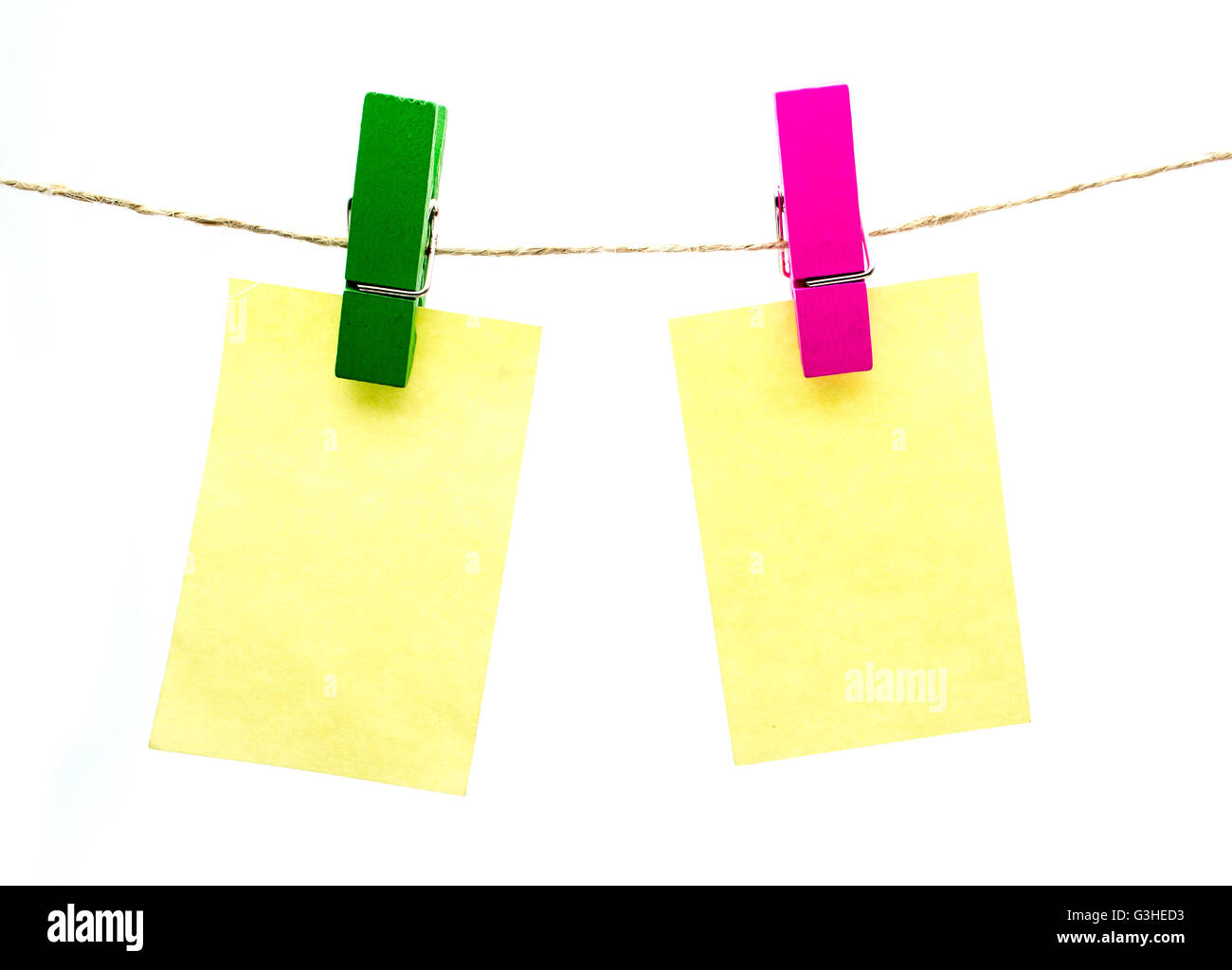 paper notes hanging on rope isolated white background Stock Photo - Alamy