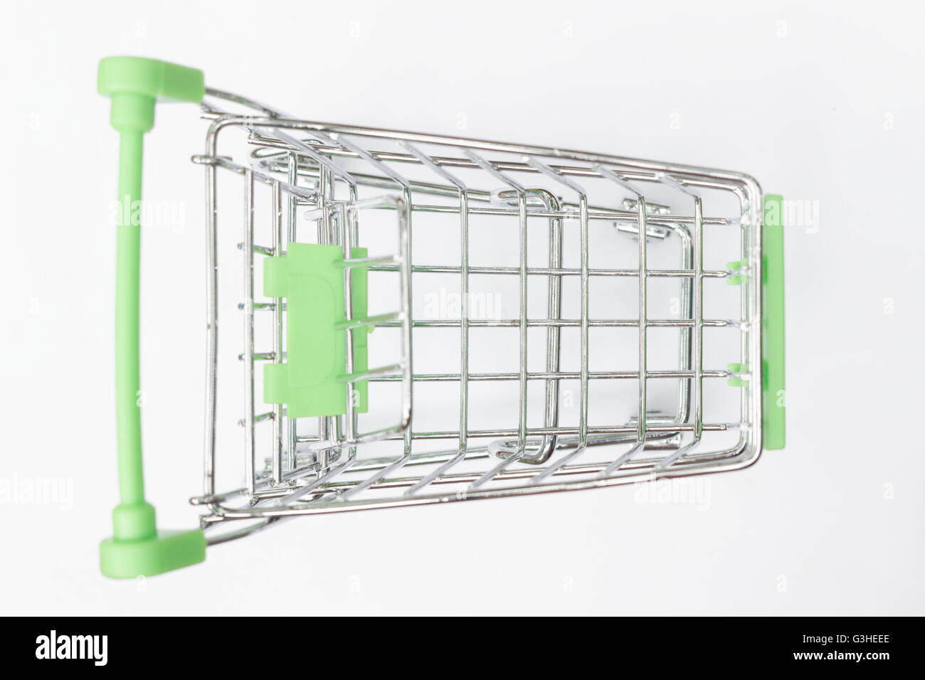 Empty shopping cart on isolated white background Stock Photo - Alamy