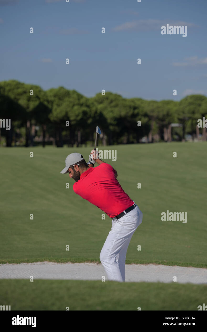 golf player shot ball from sand bunker at course Stock Photo - Alamy