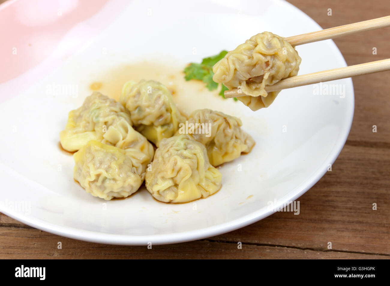 Chopsticks chinese dumpling hi-res stock photography and images - Alamy