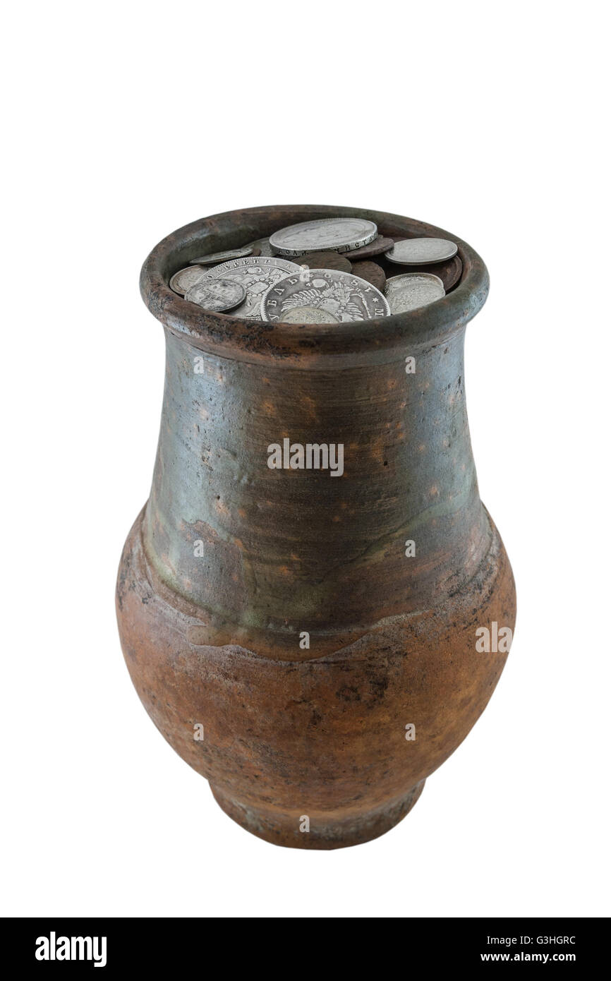 jug with silver and copper coins Stock Photo - Alamy