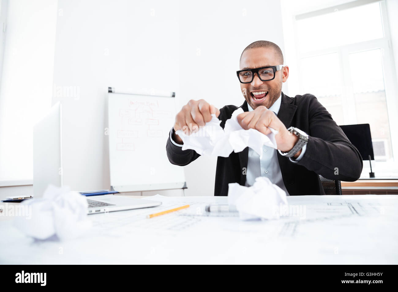 Man ripping paper hi-res stock photography and images - Alamy