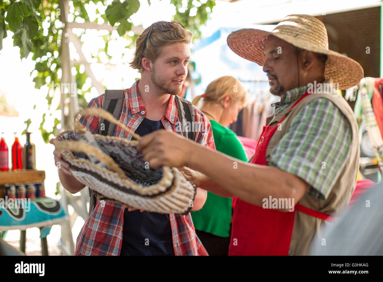 Market trader wearing apron hi-res stock photography and images - Alamy