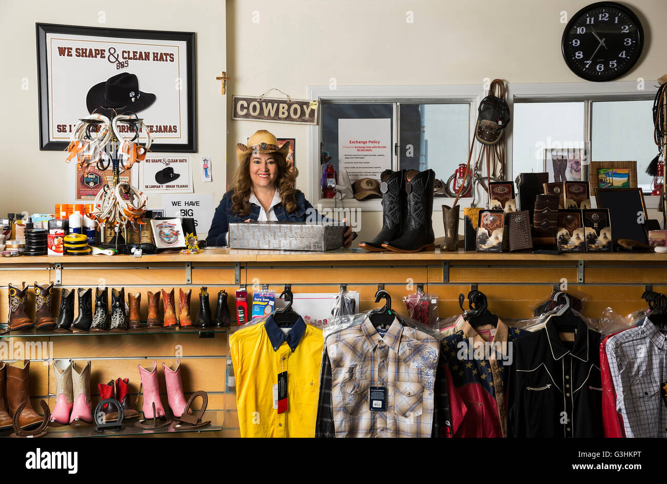 Female behind the counter hi-res stock photography and images - Alamy