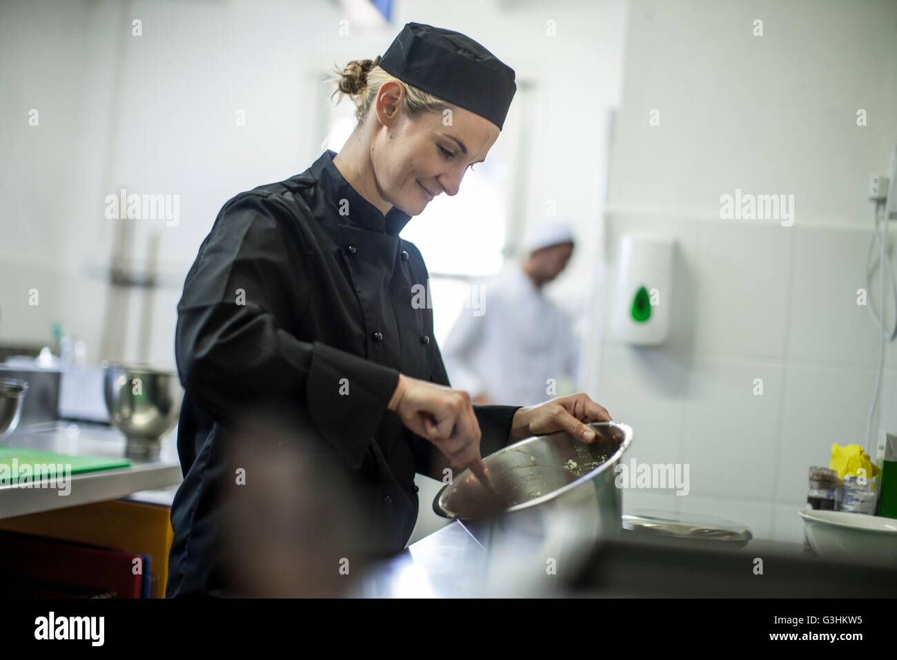Chef preparing food in kitchen Stock Photo - Alamy