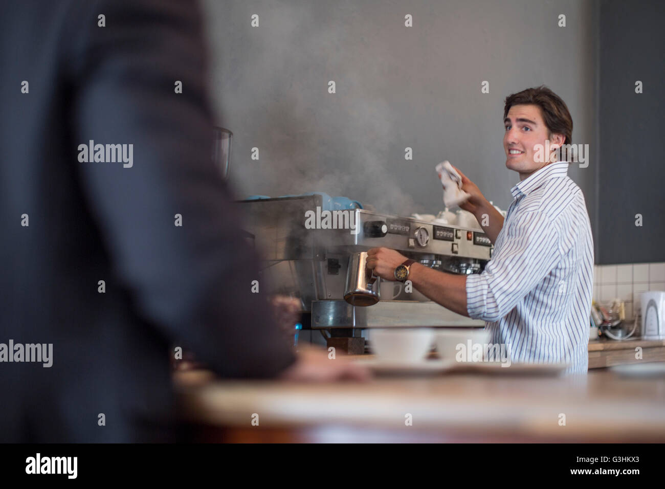Crop unrecognizable male barista hi-res stock photography and images ...