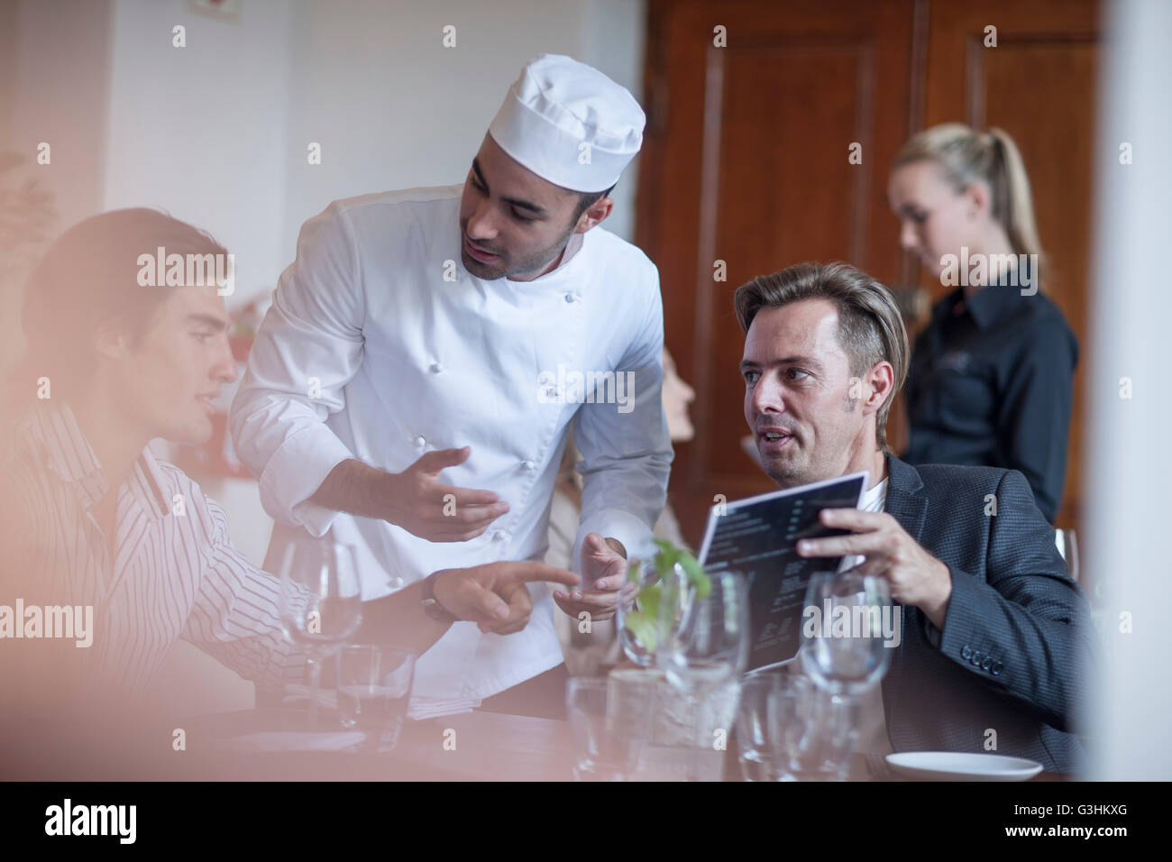 Customers sitting talking chatting hi-res stock photography and images ...