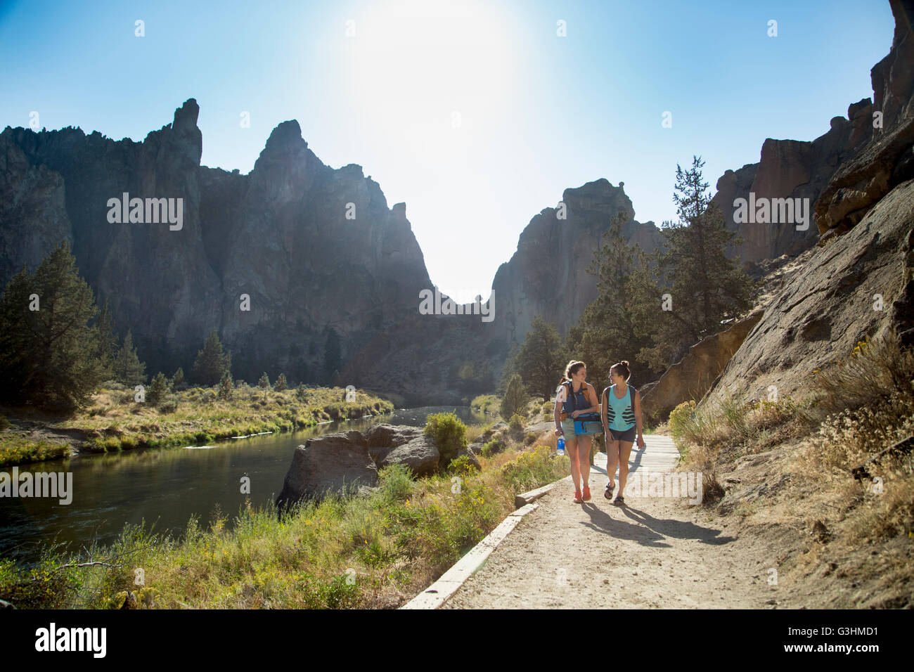 Hiking along water rocks hi-res stock photography and images - Alamy
