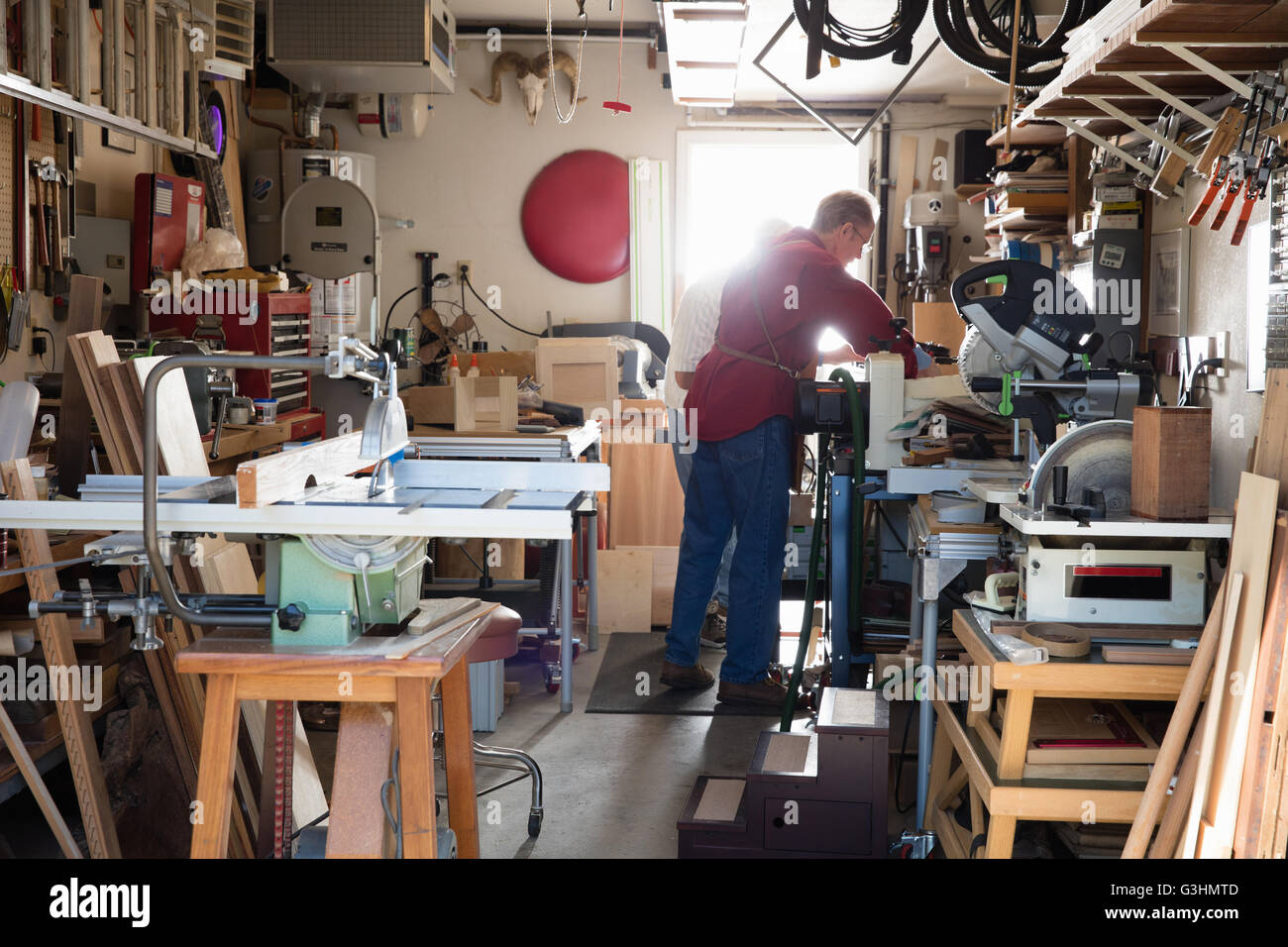 Men working on equipment hi-res stock photography and images - Alamy