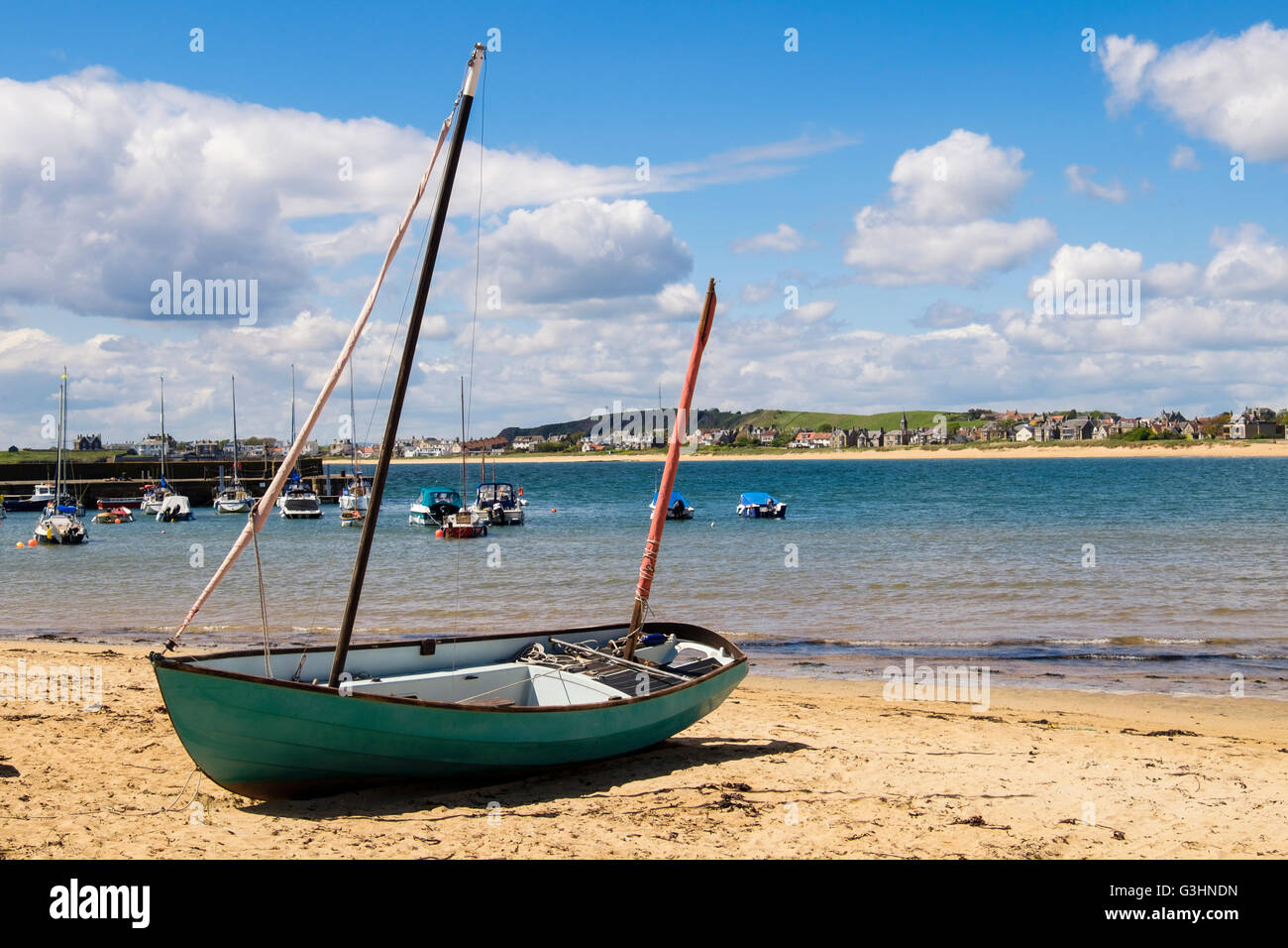 Beached boat in harbour in historic fishing village on Firth of Forth ...