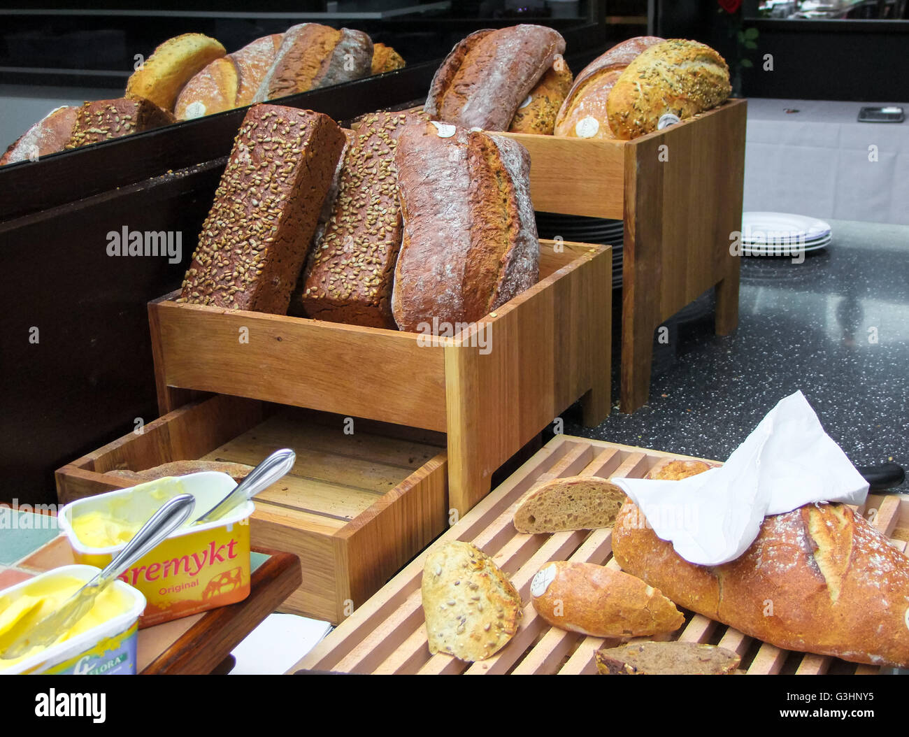 Assorted bread on serving platter Stock Photo - Alamy