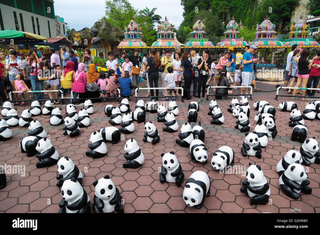 Family and friends visiting the mache pandas of 1600 Pandas campaign at ...