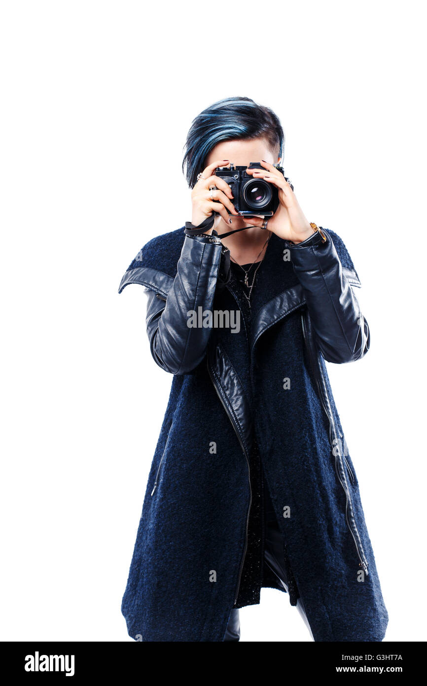 Young girl taking shot with film camera Stock Photo - Alamy