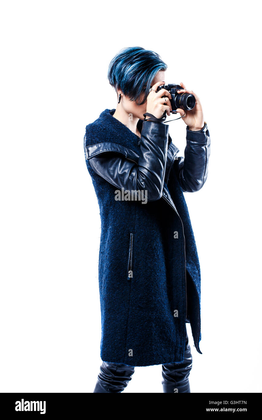 Young girl taking shot with film camera Stock Photo - Alamy