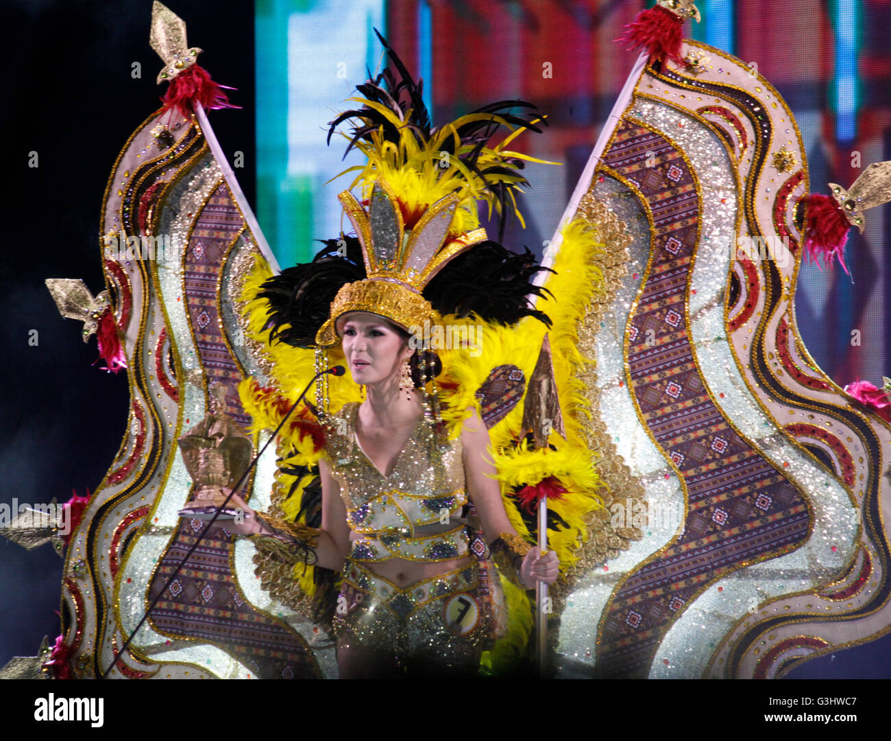 Jhoanne Tanada of Iloilo stands on stage wearing Iloilo’s Dinagyang ...