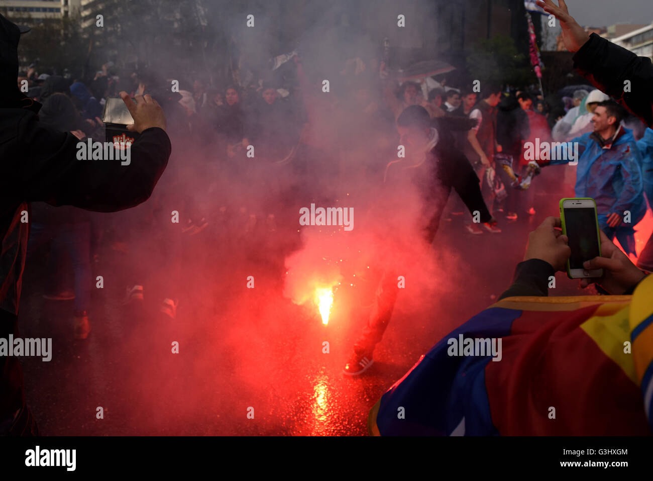 Real madrid supporters light flares hi-res stock photography and images ...