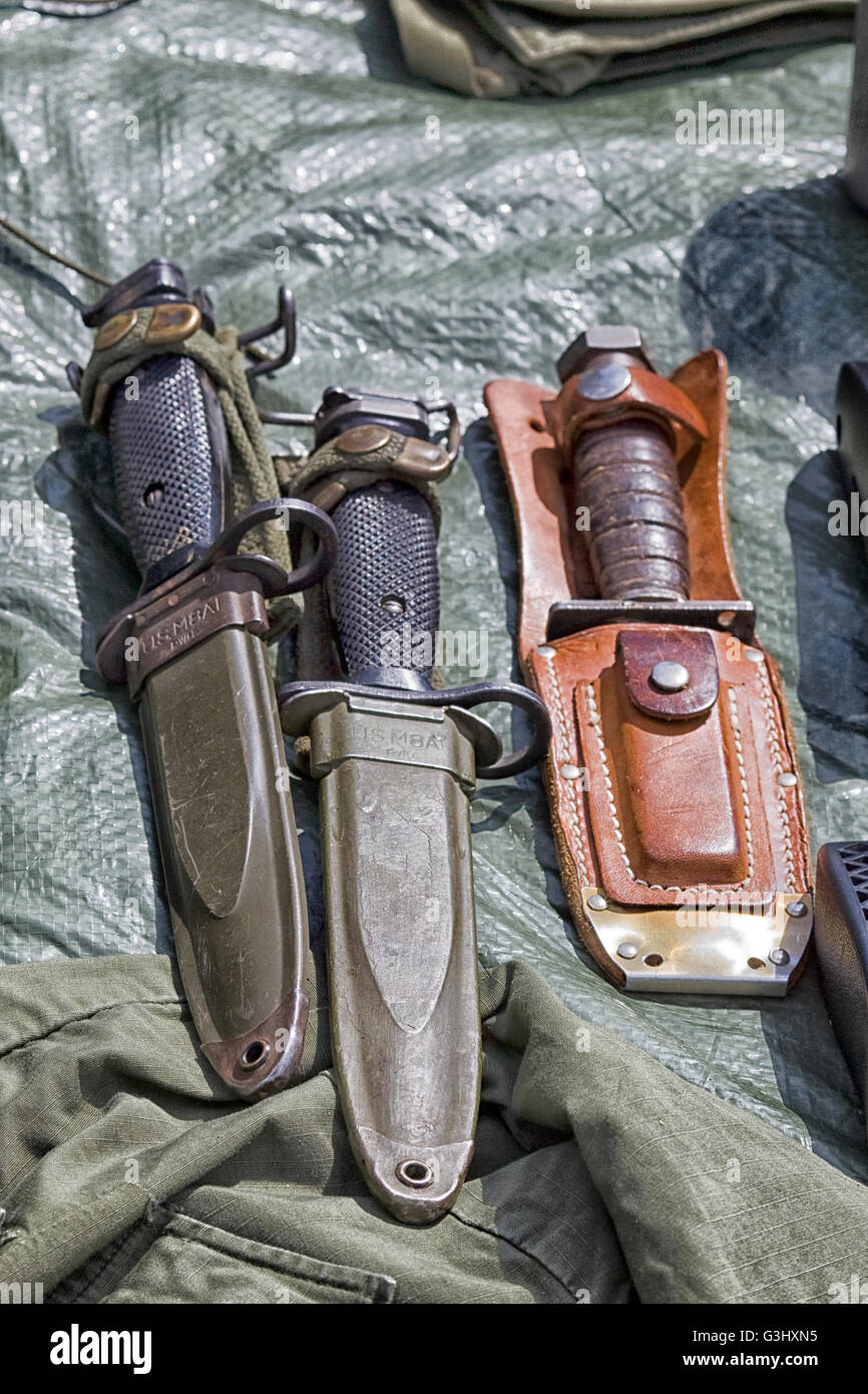 Two M7 Bayonet Knifes and a jet pilots survival knife on display Stock ...