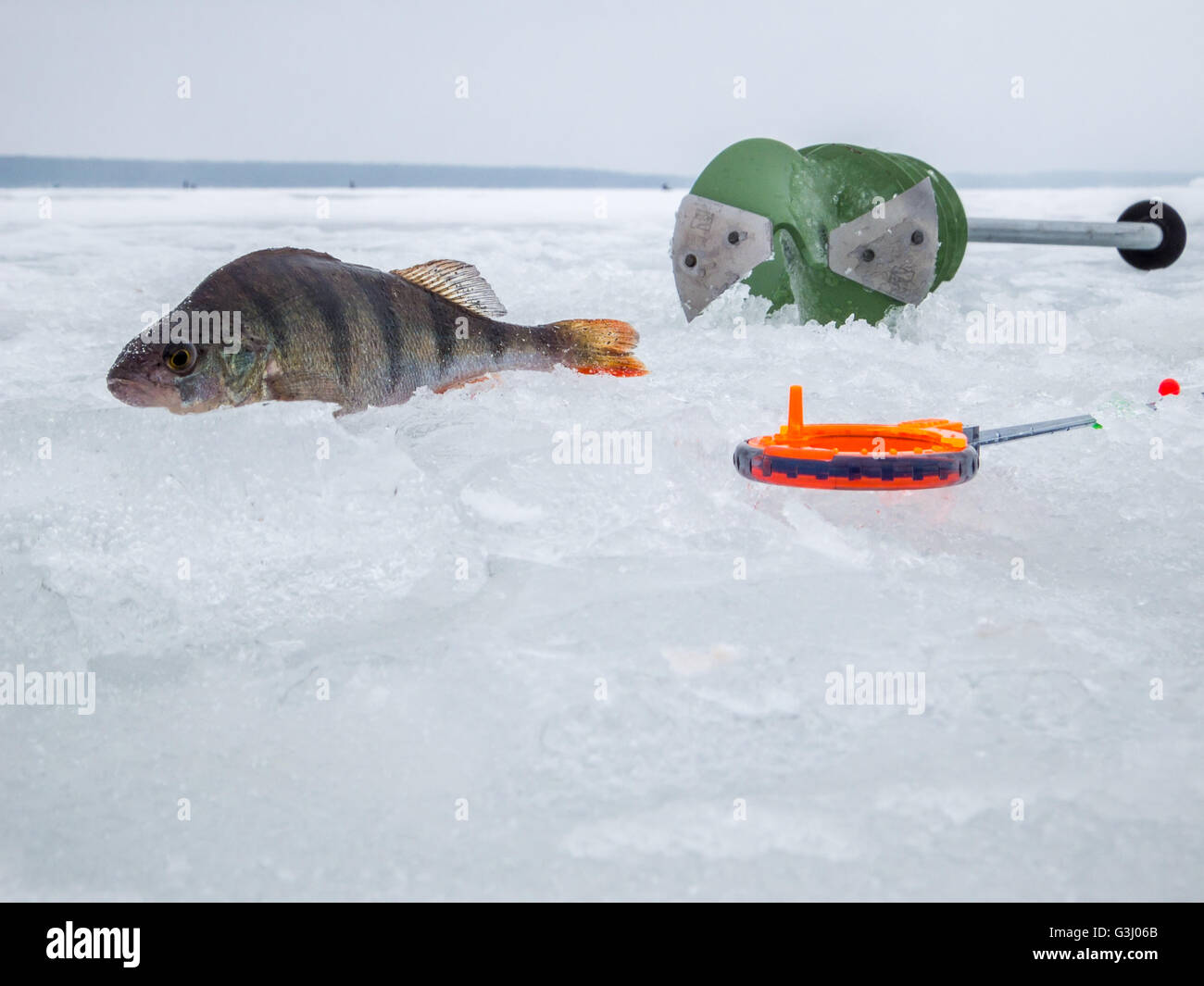 Ice fishing in Russia Stock Photo - Alamy