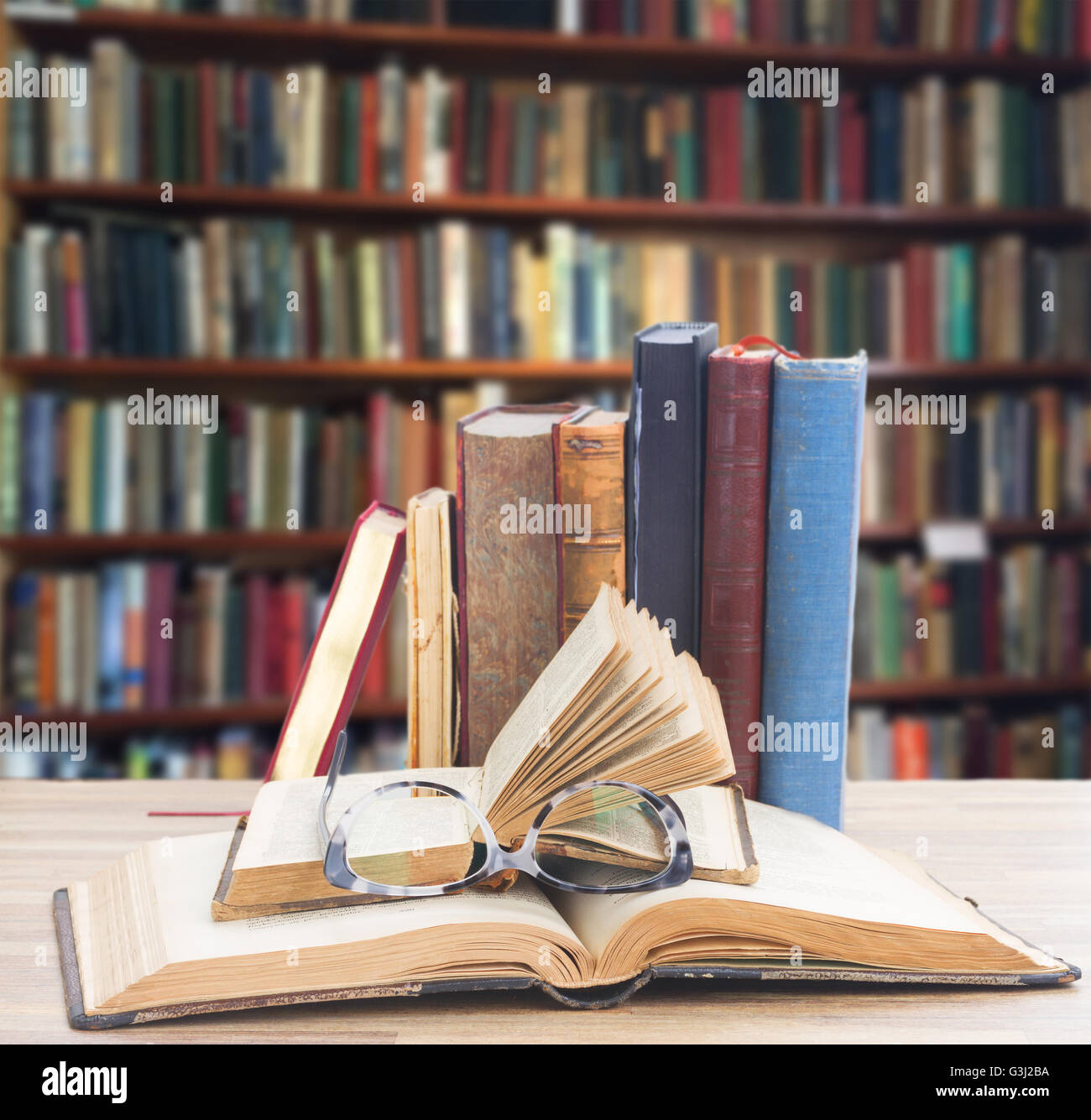 Books and glasses Stock Photo - Alamy