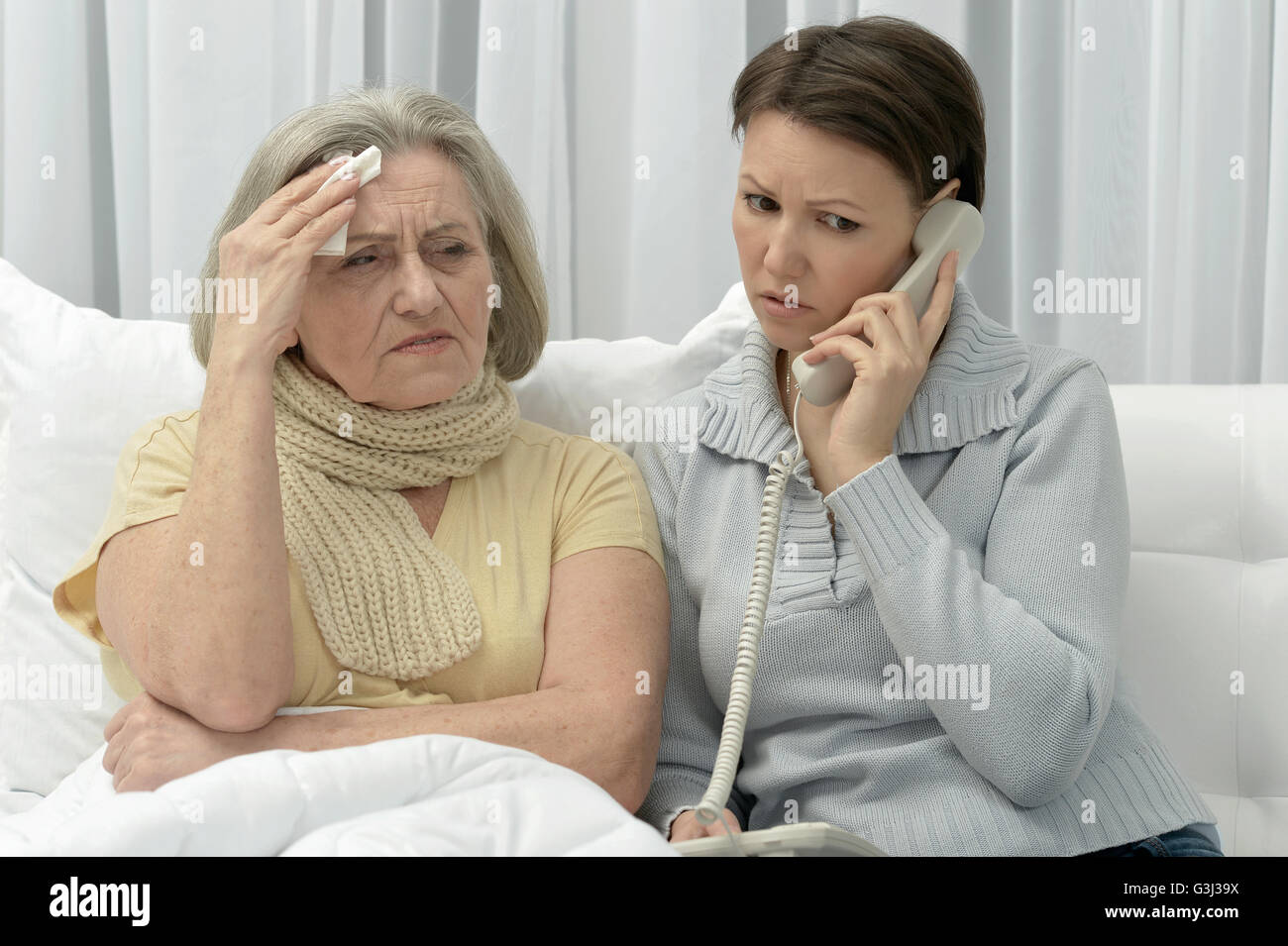 Worried grandmother with daughter hi-res stock photography and images ...