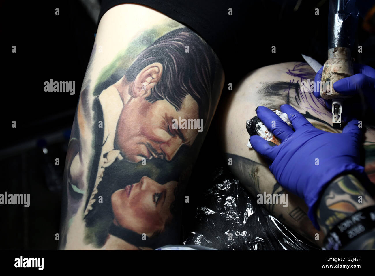 Athens, Greece. 13th May, 2016. People get tattooed during the three ...