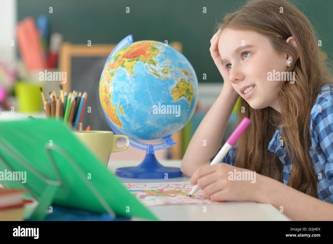 student girl at class Stock Photo - Alamy