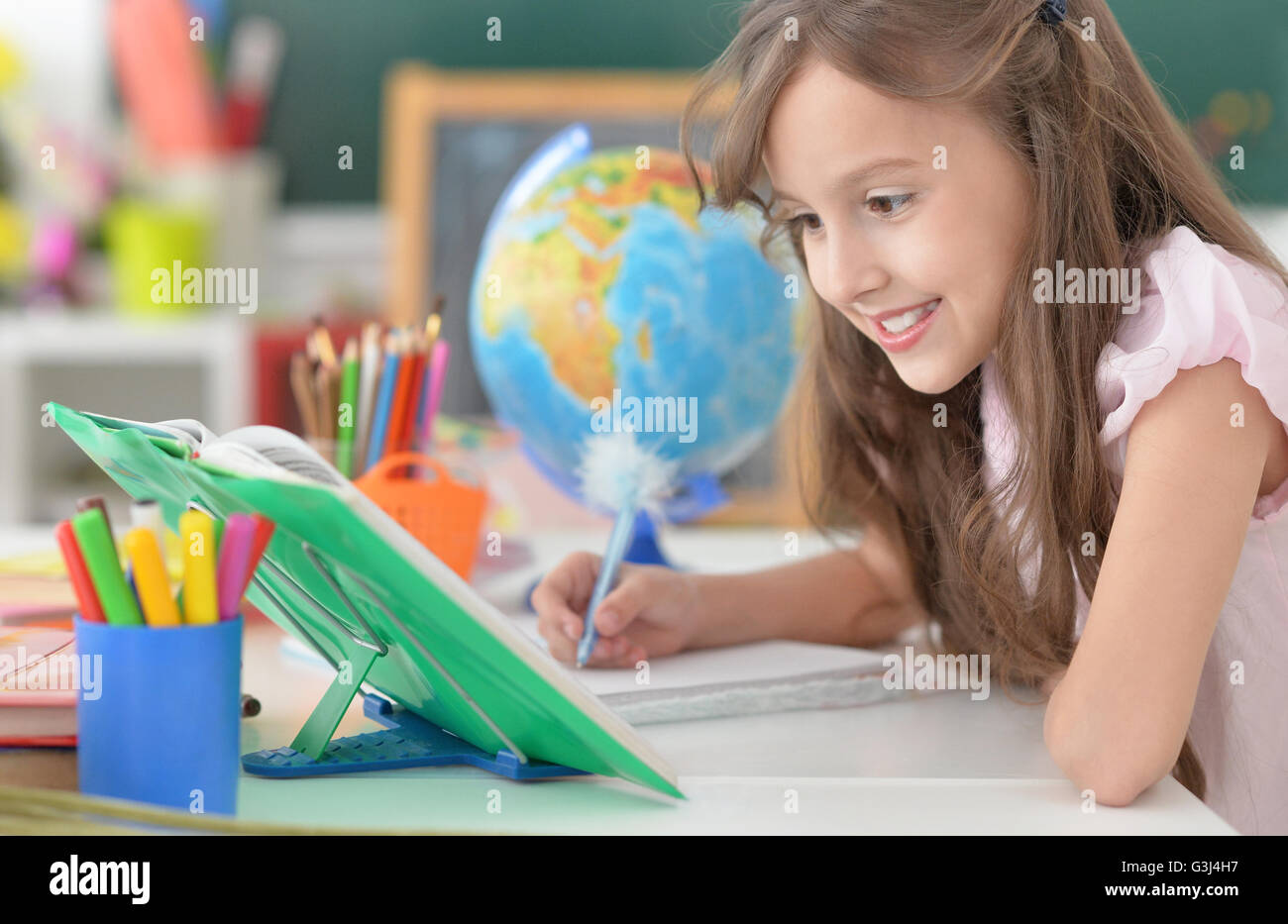 student girl at class Stock Photo - Alamy