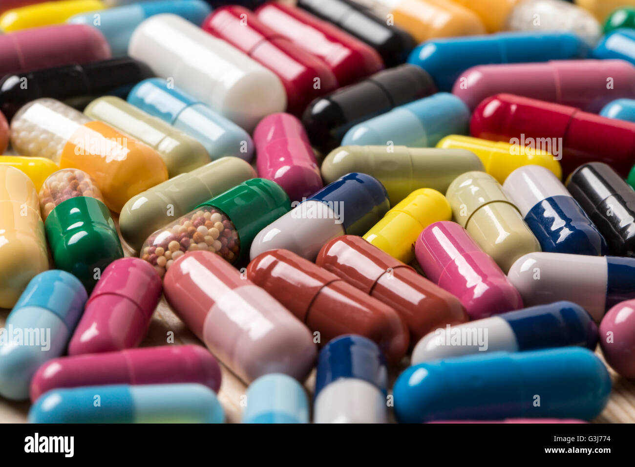 Heap of colorful drugs and pills Stock Photo - Alamy