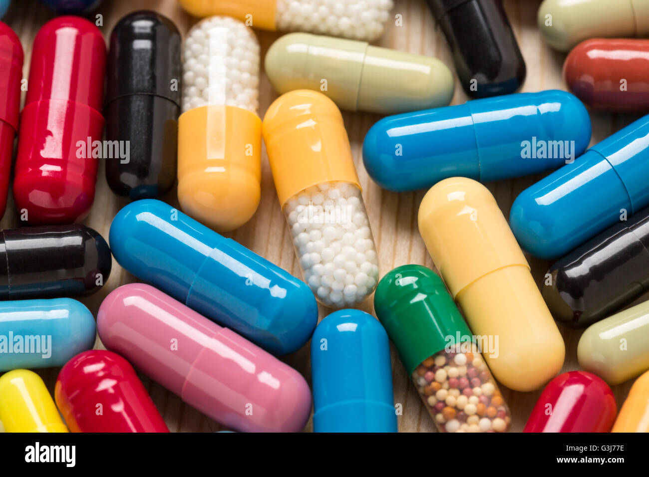 Heap of colorful drugs and pills Stock Photo - Alamy