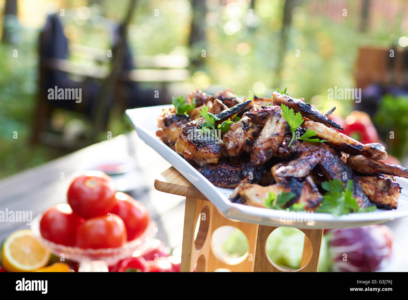 grilled chicken wings outdoor Stock Photo - Alamy