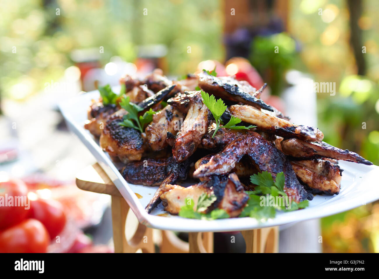 grilled chicken wings outdoor Stock Photo - Alamy
