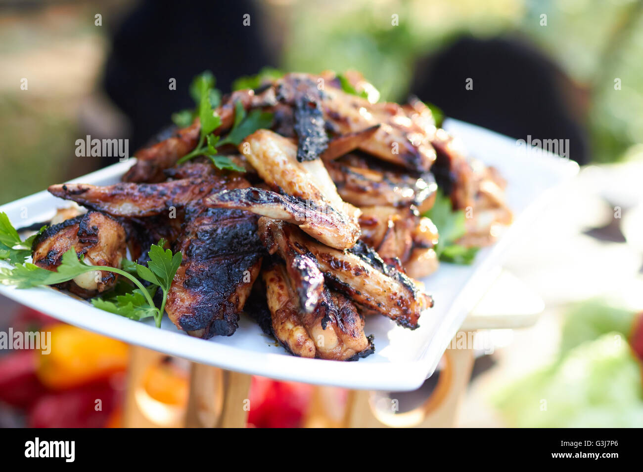 grilled chicken wings outdoor Stock Photo - Alamy