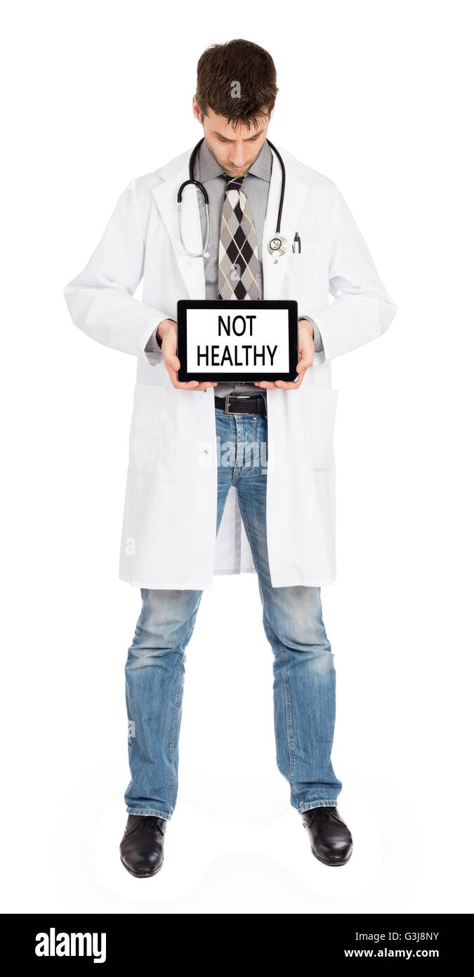 Doctor holding tablet, isolated on white - Not healthy Stock Photo - Alamy