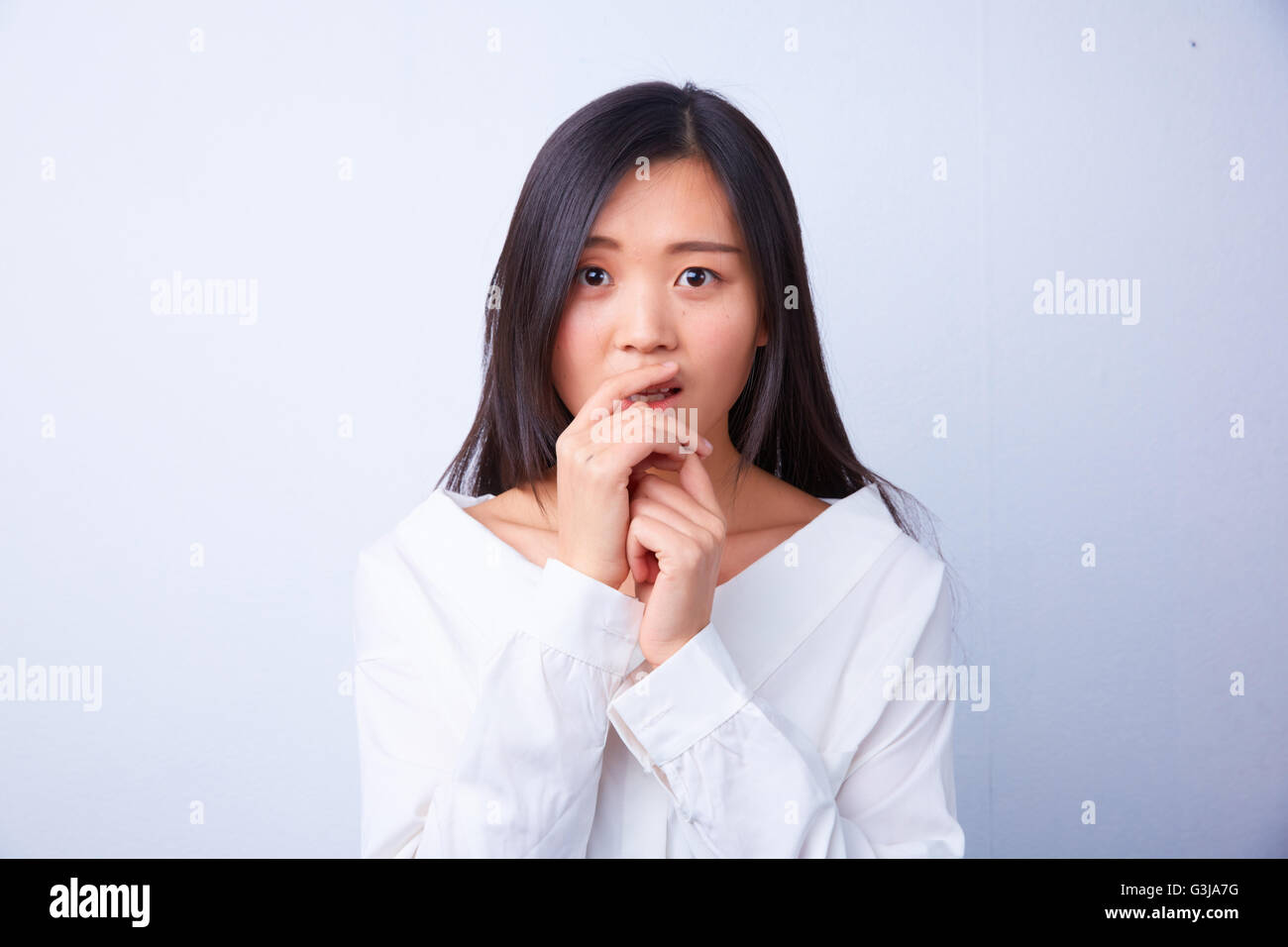 Chinese girl surprised and shocked Stock Photo - Alamy