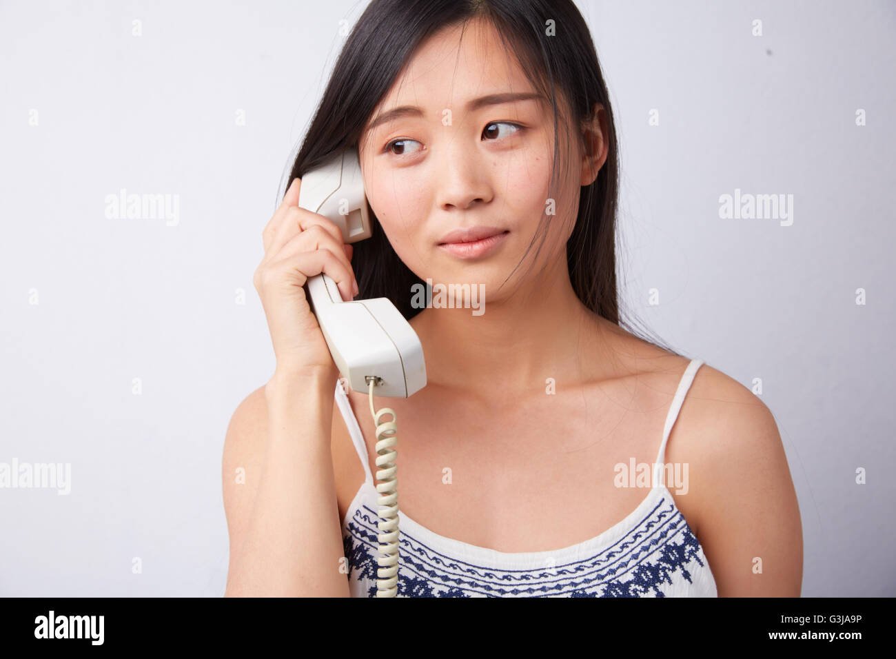 Chinese woman spoke stationary phone Stock Photo - Alamy