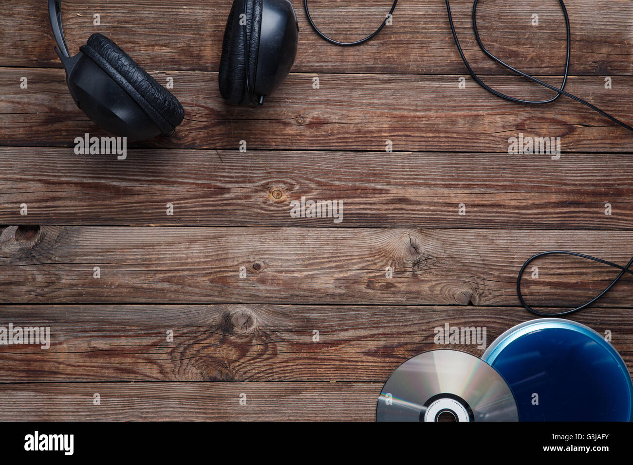 top view of music cd player equipment on wooden desk Stock Photo - Alamy