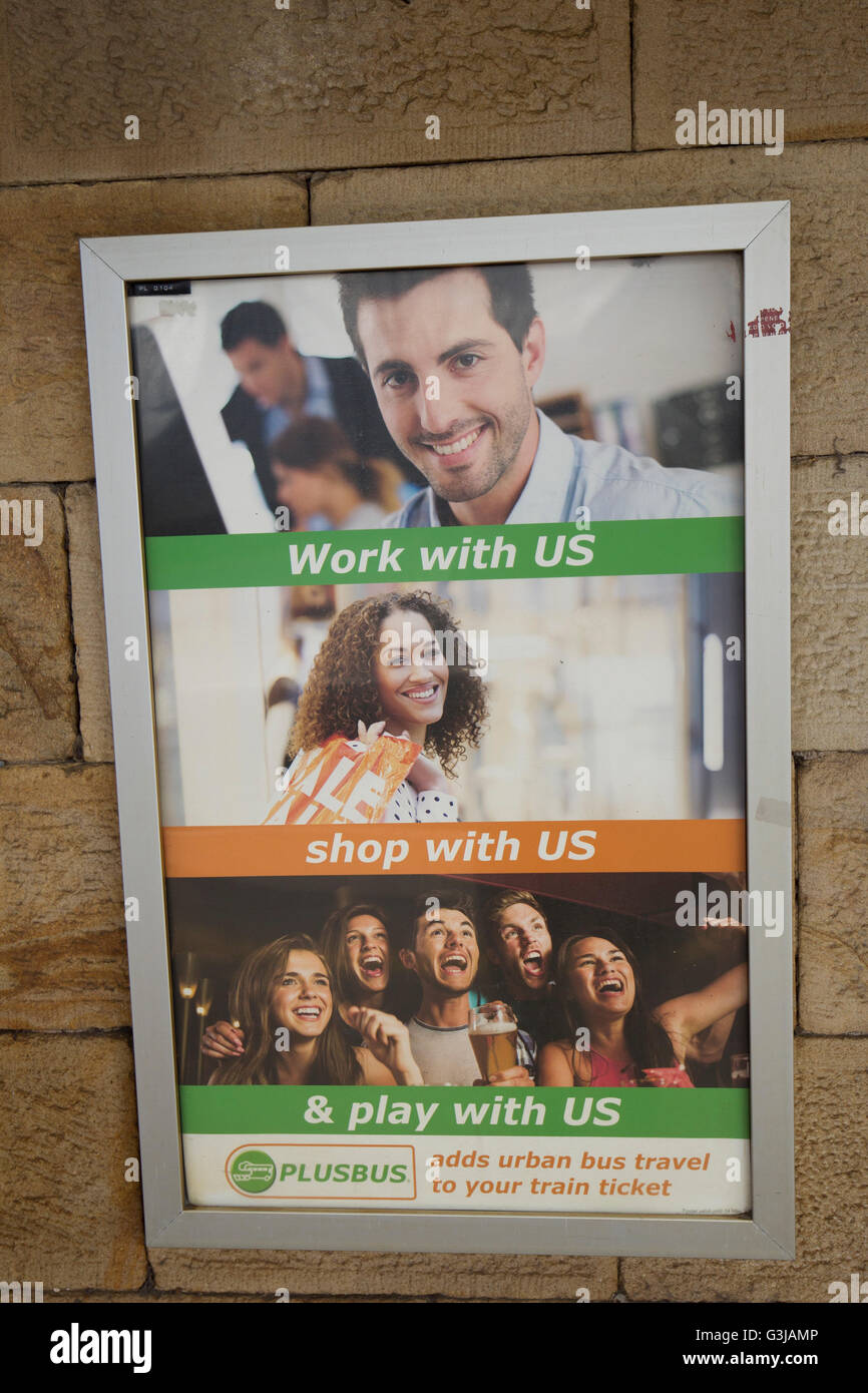 Plus Bus poster advertisement railway station sign Stock Photo - Alamy