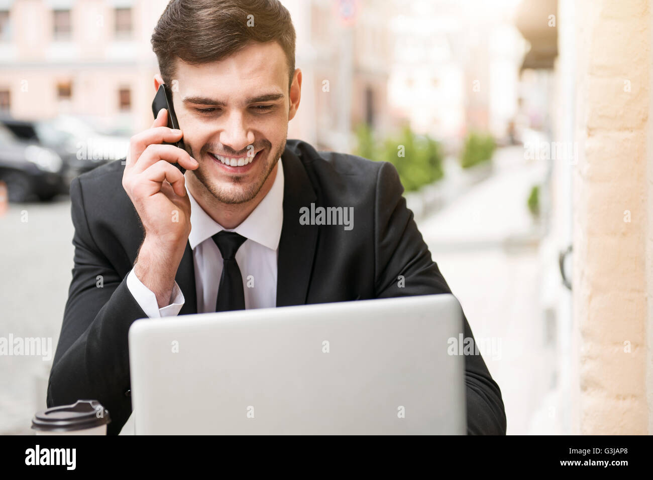 Pleasant delighted man talking hi-res stock photography and images - Alamy