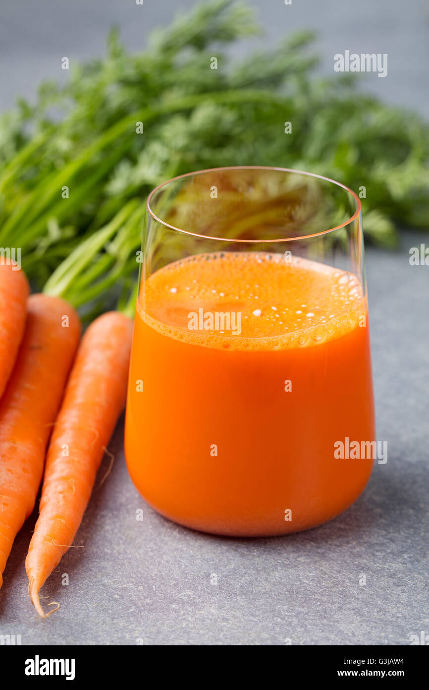 Carrot juice glass and fresh carrots Healthy food Stock Photo - Alamy