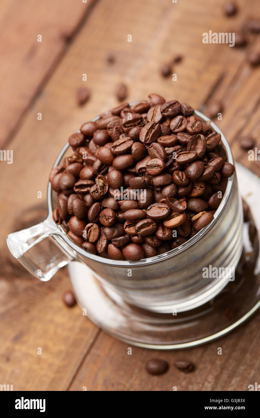 coffee beans in cup in the tray Stock Photo - Alamy