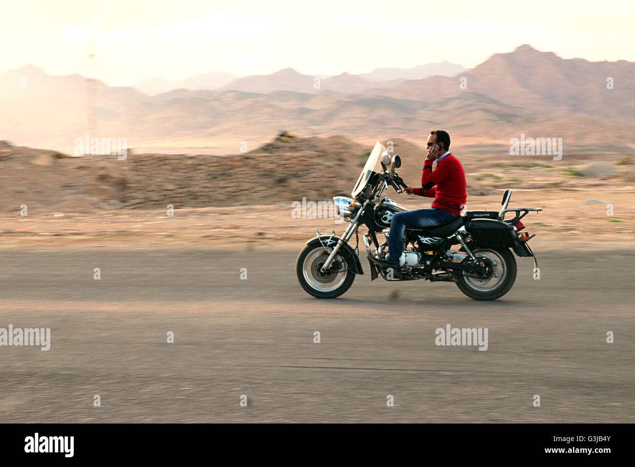 Man riding motorcycle hi-res stock photography and images - Alamy