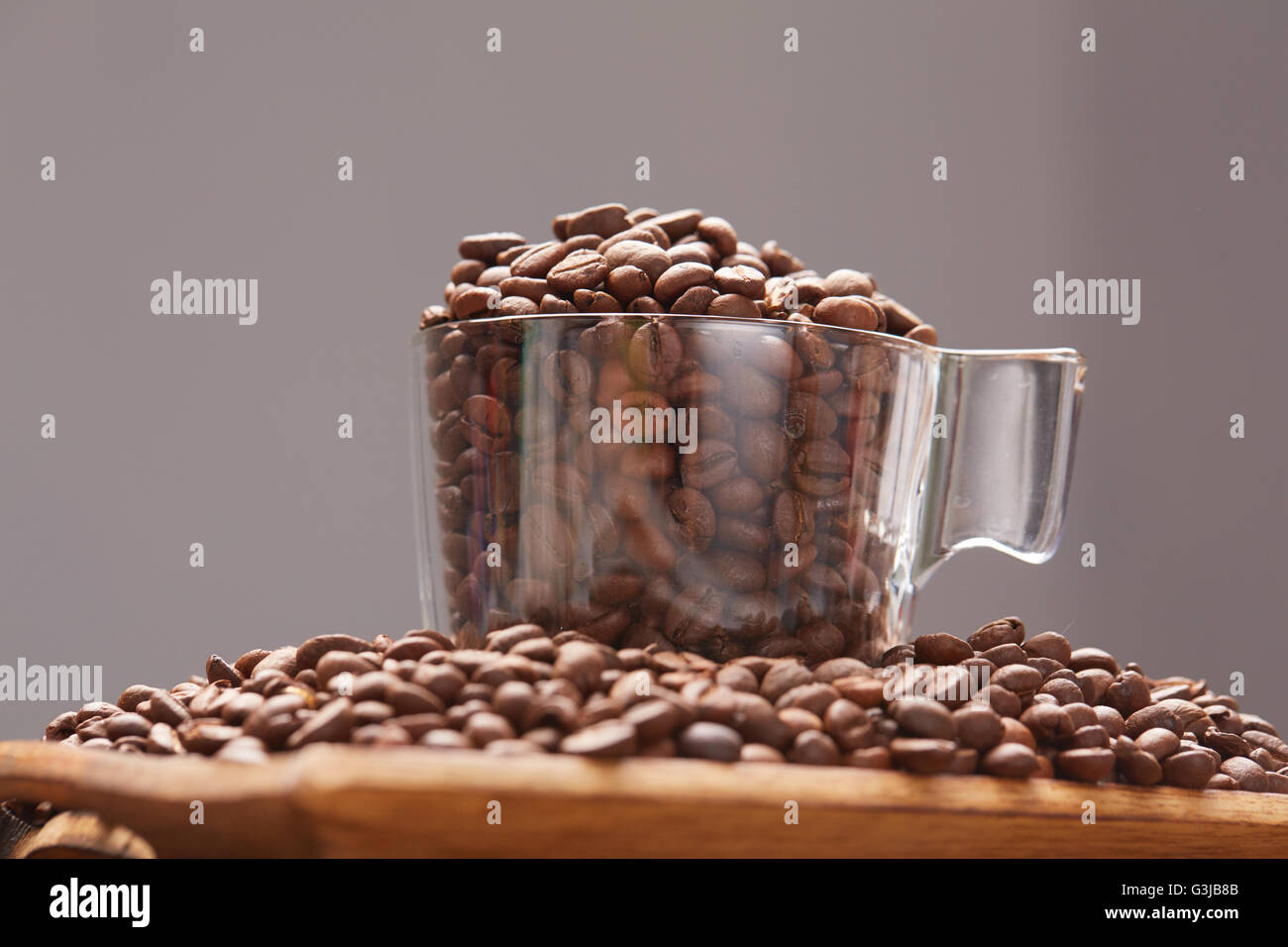 coffee beans in cup in the tray Stock Photo - Alamy