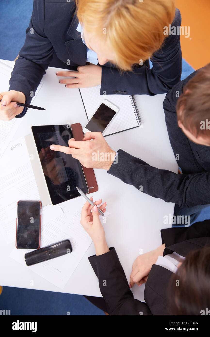 Three businessmen at a meeting Stock Photo - Alamy