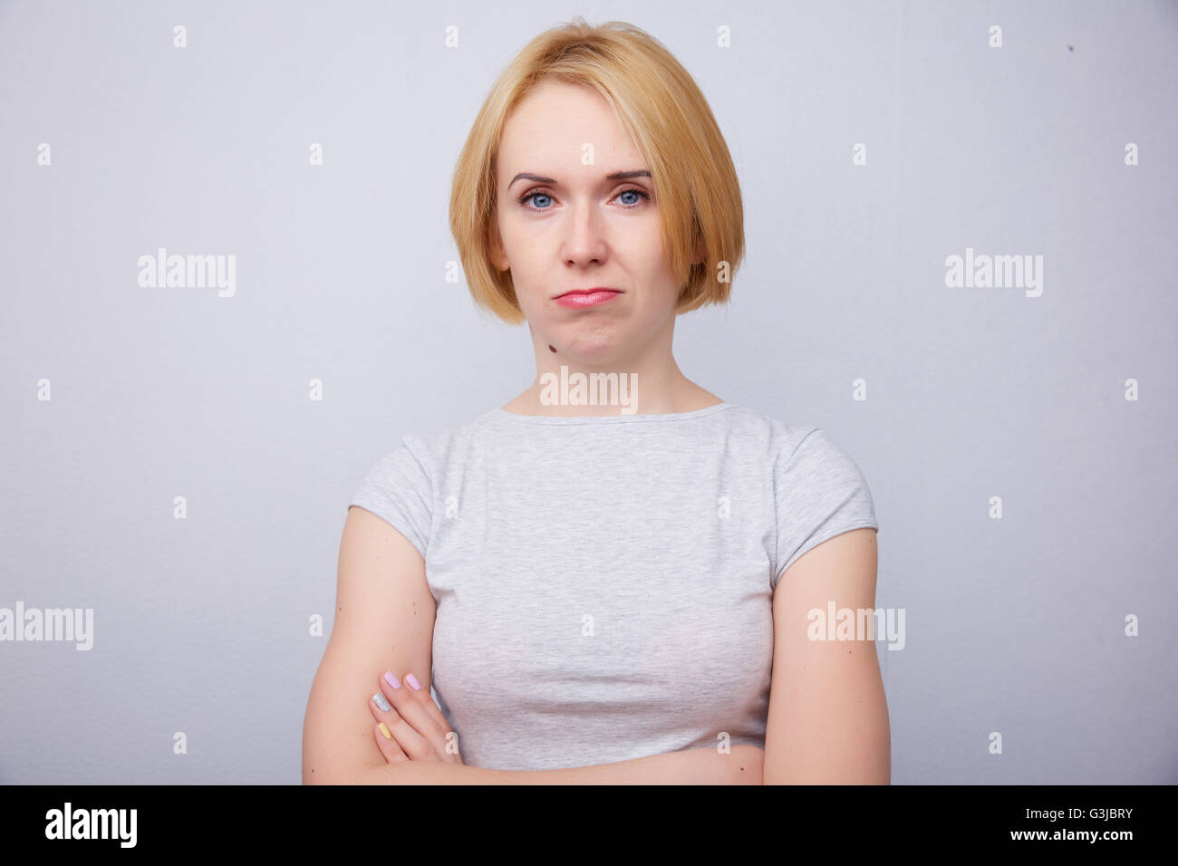 blonde guilty look Stock Photo - Alamy