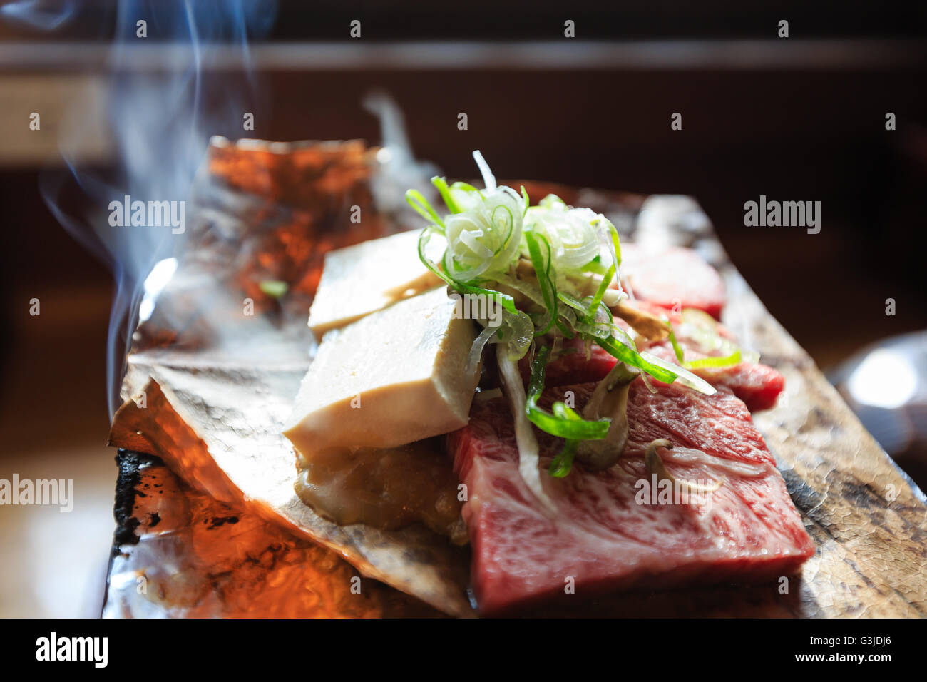 Cooking the delicious Japanese Hida Beef with garlic, onion, tofu Stock ...