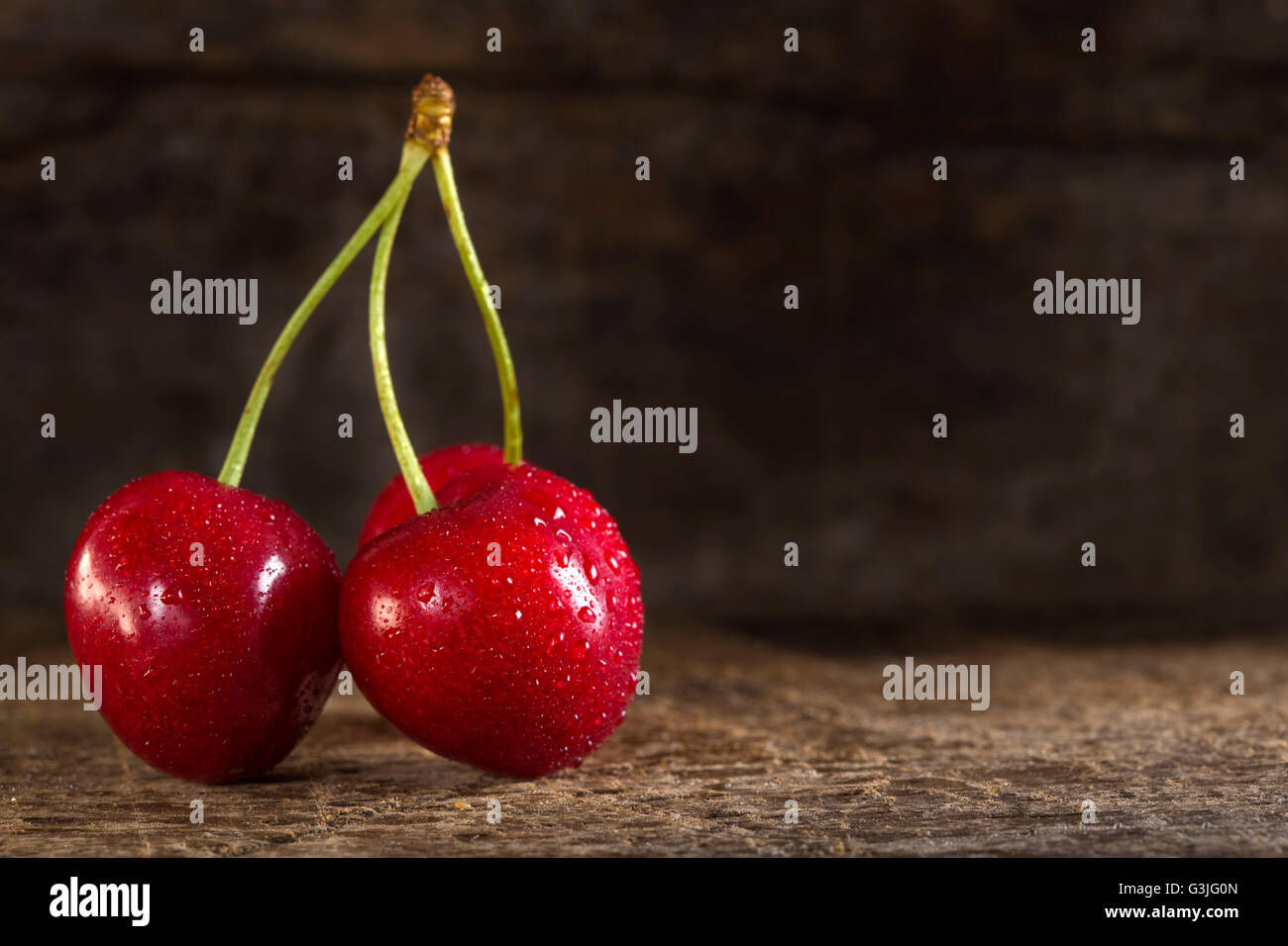 Cherries background hi-res stock photography and images - Alamy