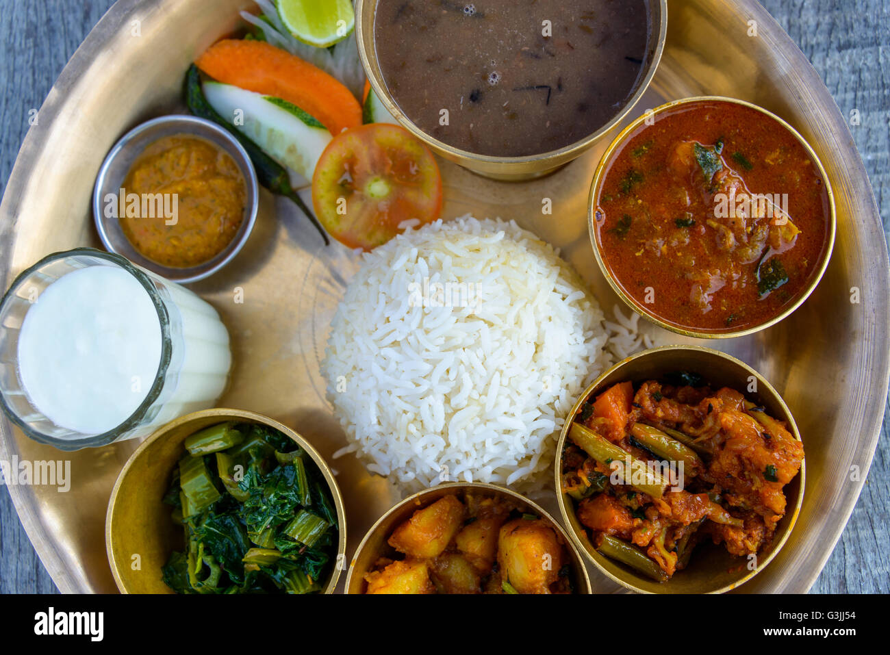 Traditional Nepalese thali in a restaurant Stock Photo - Alamy