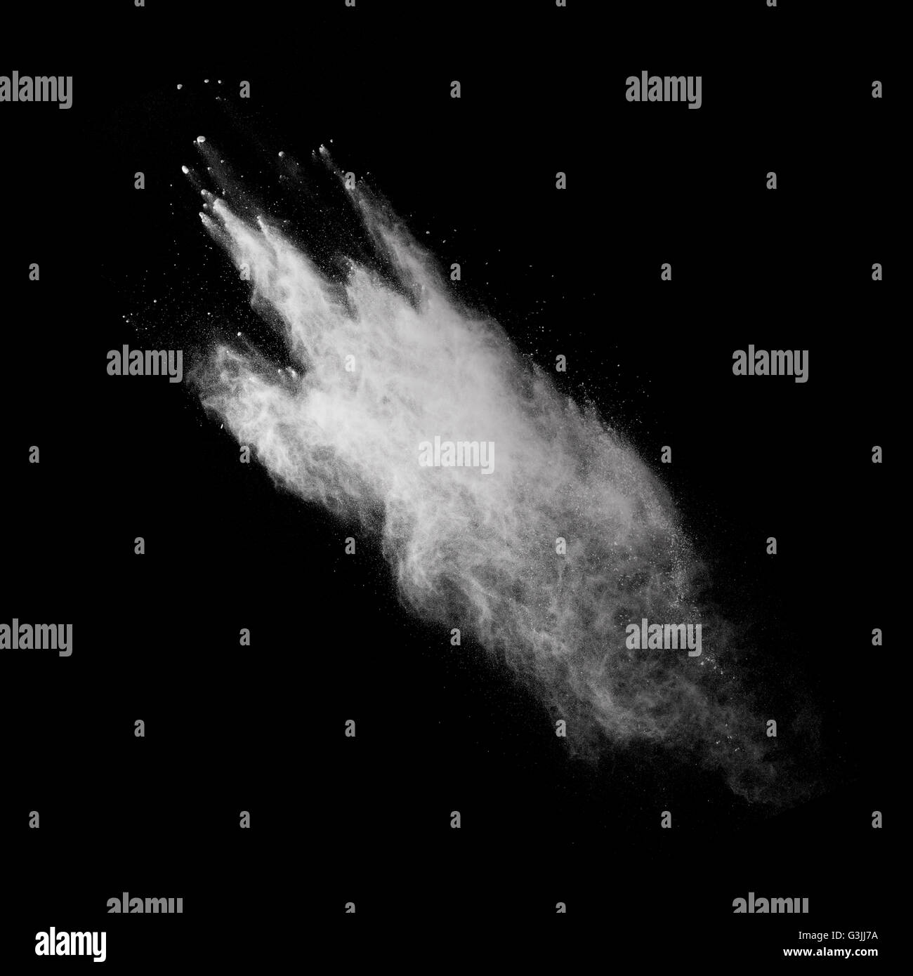 White powder explosion isolated on black background Stock Photo - Alamy